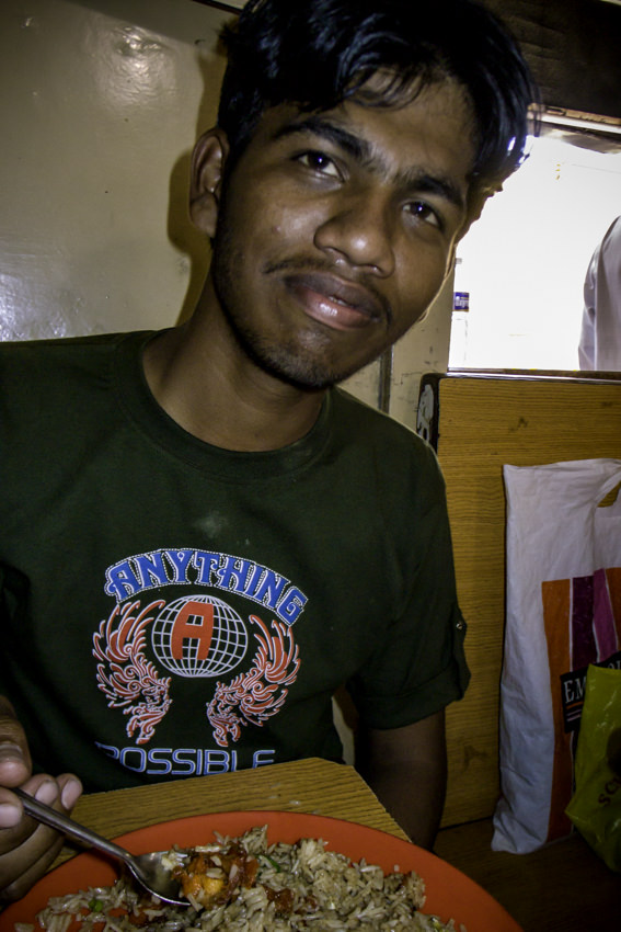 [Pune, India] Young Man's Lunch Was Fried Rice | Photo by awazo.com