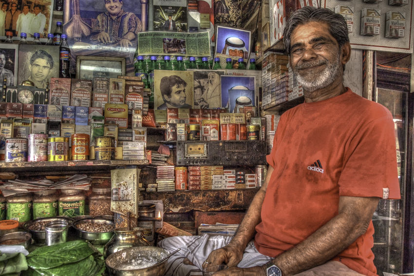 [Kolkata, India] Man And Many Boxes Of Cigarette | Photo by awazo.com