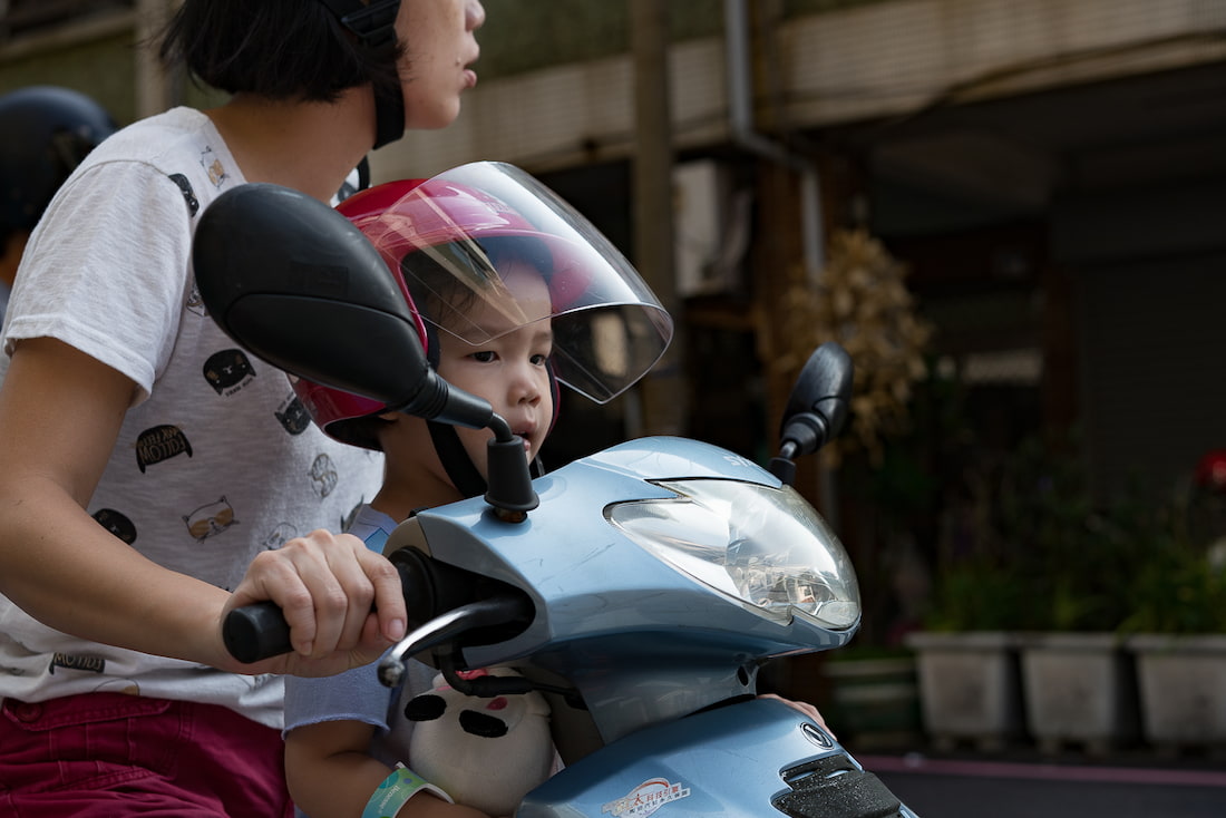 A Boy Riding A Motorcycle With His Mother [Taiwan] Travel, Photo and ...