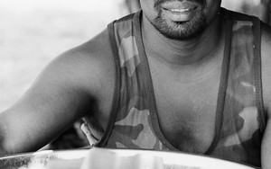 Man Emptying A Plastic Bag (Thailand) | BOXMAN fotologue